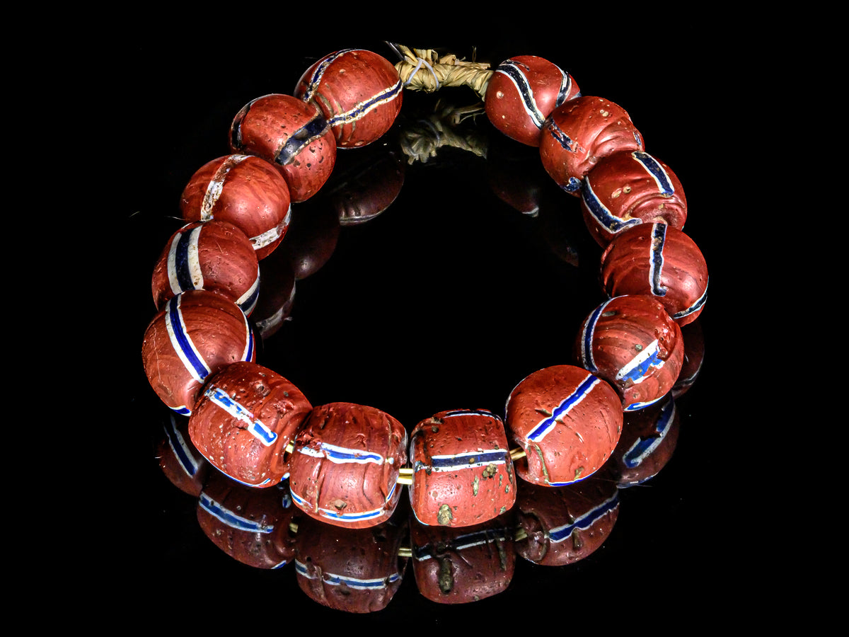 A Strand of 14 Brick Red Striped Venetian African Trade Beads ...